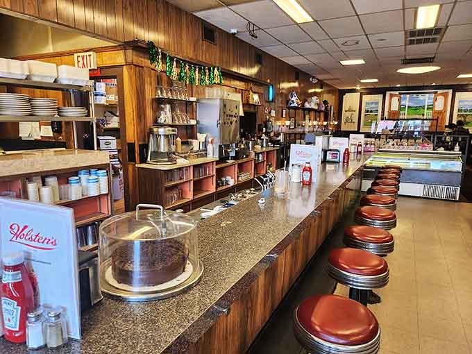 Classic counter seating where every chrome-trimmed stool tells a story of sundaes past and milkshakes present.
