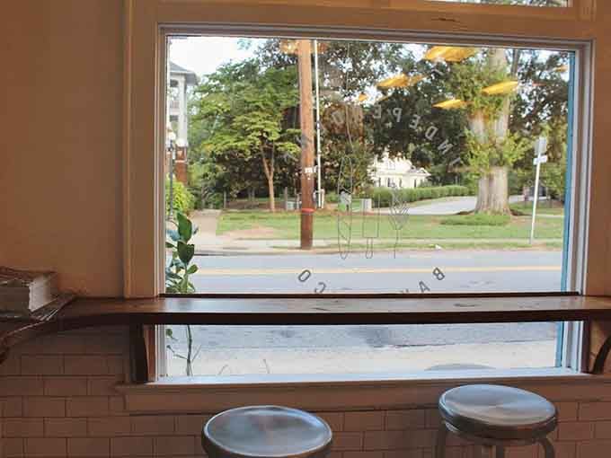 Window seating with a view of Athens life passing by turns your morning pastry into a front-row seat to the neighborhood.