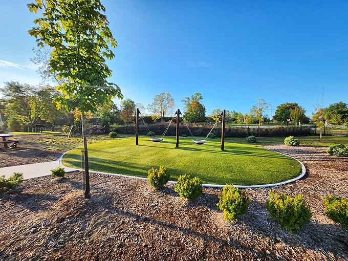 Swings positioned on gentle hills add extra thrill to an already perfect childhood staple, simple genius really.