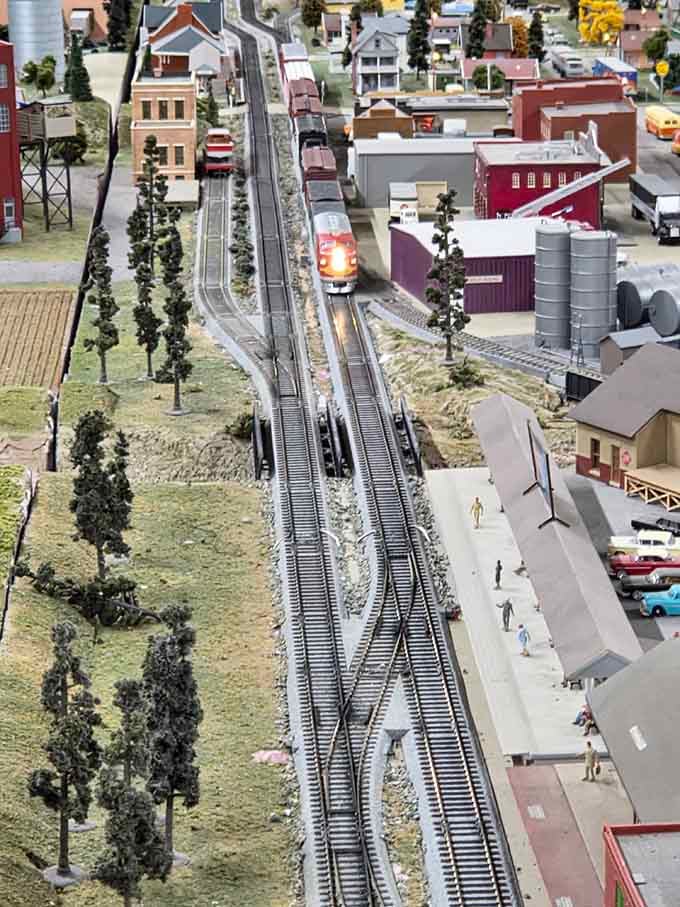 Trains glide through residential neighborhoods where every house could tell its own story if walls could talk.