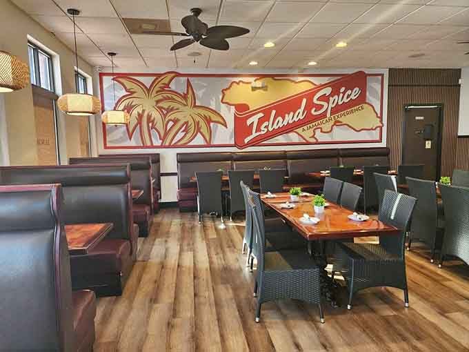 Booth seating under that vintage-style Island Spice mural sets the perfect stage for feasting.