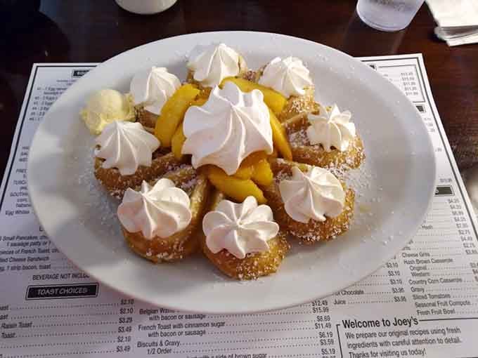 Peaches, waffles, and whipped cream clouds&mdash;basically summer vacation on a plate, no matter what season it is.