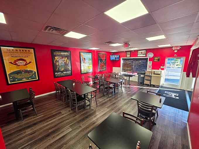 Vintage travel posters on cherry-red walls create an atmosphere that's part diner, part time machine to simpler, tastier days.