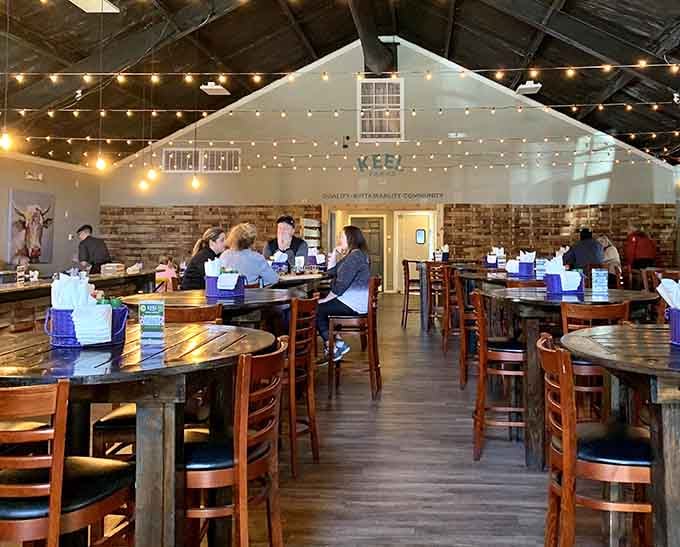 Locals gather around tables, savoring wines and conversation in a space that feels welcoming and unpretentious.