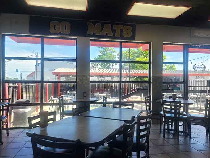 Natural light streaming through those generous windows creates the perfect atmosphere for savoring every single bite of lunch.