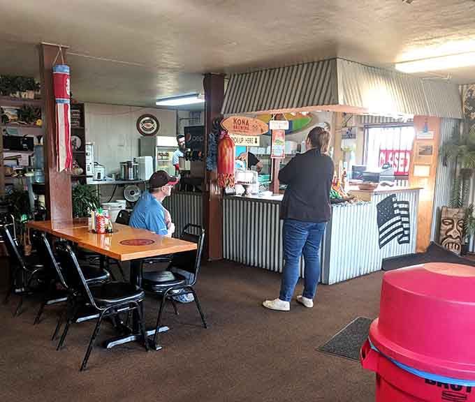 Real customers ordering real food at a real counter, no Instagram filters required for authenticity here.