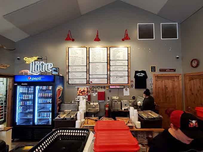 Behind that counter, magic happens one slow-smoked rack at a time, feeding hungry souls daily.