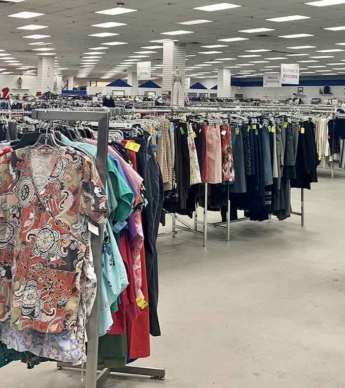 Clothing racks organized by color create a shopping experience that's actually pleasant instead of overwhelming chaos.