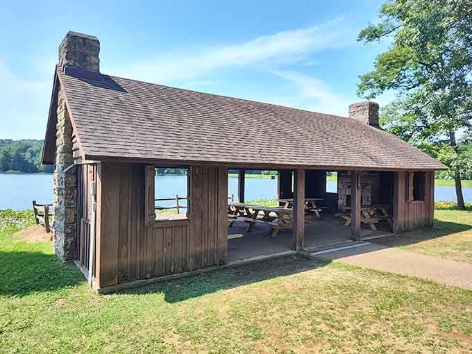 This lakeside pavilion offers the perfect spot for family reunions where Uncle Bob's stories actually sound better with nature's soundtrack.