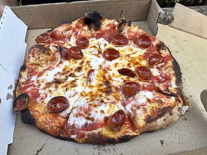 Wood-fired pepperoni pizza that's charred just right, because apparently this farm does everything well and it's almost annoying.