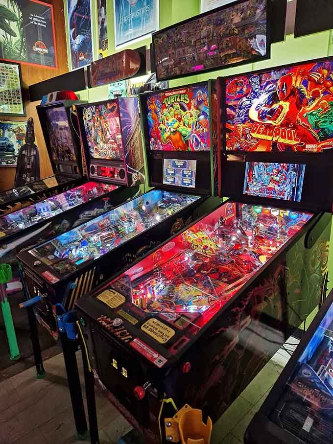 Teenage Mutant Ninja Turtles and Deadpool pinball machines glow with promise, their flippers ready for your silver ball mastery.