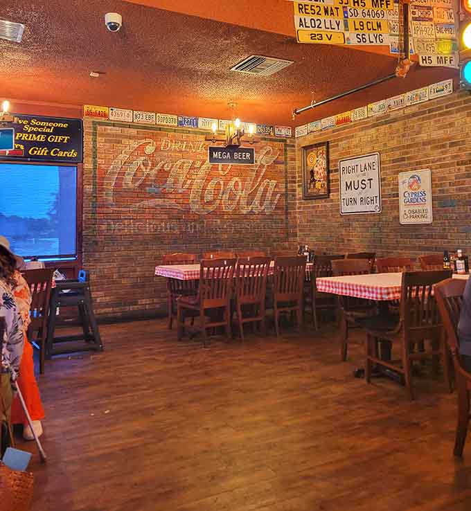 Exposed brick and vintage signs create an atmosphere that's equal parts museum and your favorite neighborhood hangout.