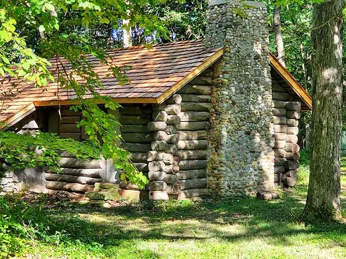 This charming log cabin sits peacefully among the trees, a reminder of simpler times and pioneer craftsmanship.