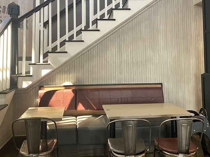 Tucked beneath the grand staircase, this cozy nook proves even fast food needs its own Downton Abbey moment.