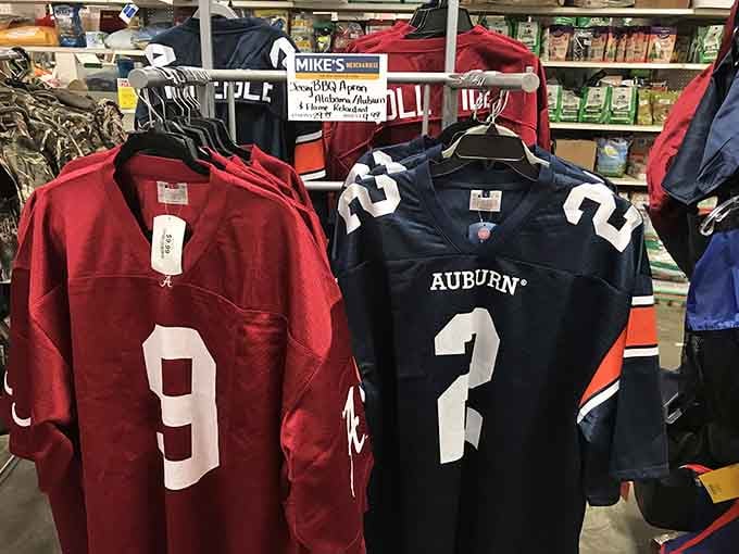 Alabama and Auburn jerseys hanging side by side peacefully, because even rivals can coexist when the prices are this good.
