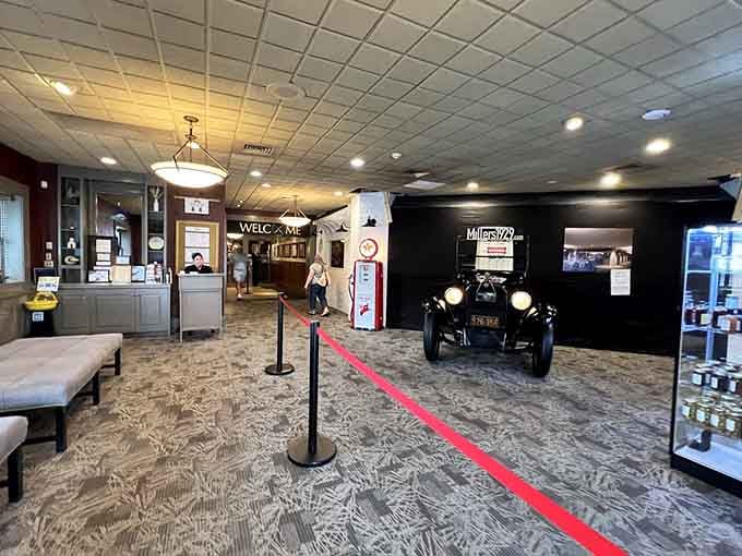 The welcoming lobby with its vintage car sets the stage for your journey into comfort food.