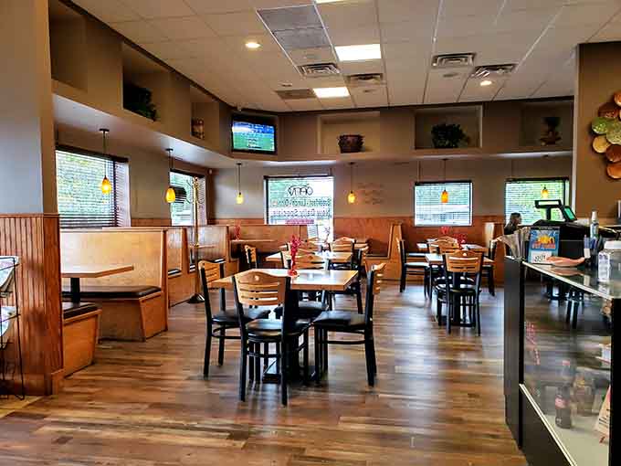 Spacious booths and tables where families gather, friends catch up, and strangers become regulars over great food.