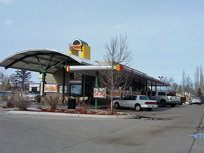 Retro drive-in canopy shelters comfort food cravings, where tots and shakes still taste like simpler, happier times.