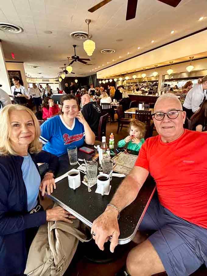 Generations sharing a table, proving good food brings people together better than any social media algorithm.