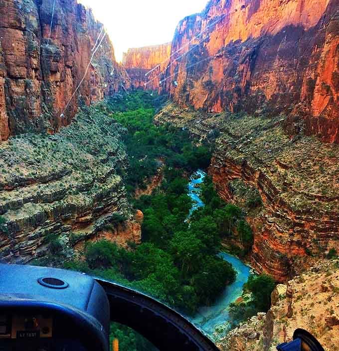 From above, the blue water snaking through green vegetation looks almost too perfect to be real.