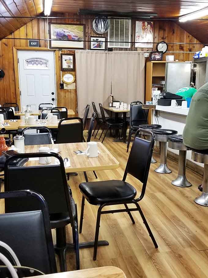 Wood-paneled walls and mismatched chairs create the kind of authentic atmosphere money can't buy.