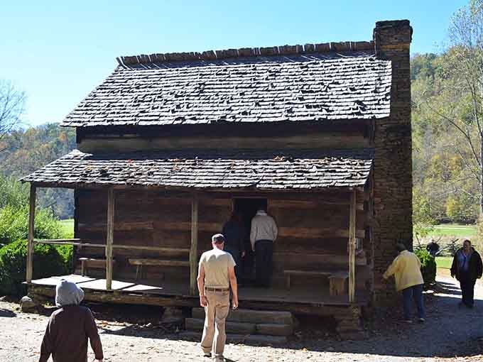Visitors explore the Davis House, where families lived without complaining about slow internet or small closets.