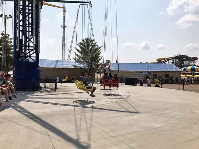 Classic swing rides offer gentler thrills for those who prefer their fun without the stomach-dropping roller coaster intensity.