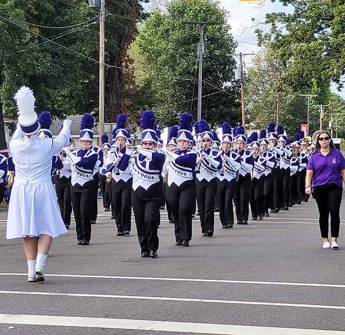 Marching bands in perfect formation prove that small-town talent and dedication create big-time entertainment for everyone watching.