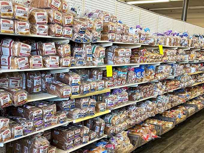 Bread aisle stretching endlessly, because carbs are life and shouldn't cost your firstborn child to enjoy.