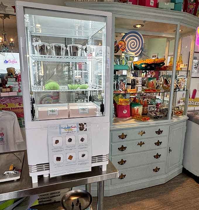 Vintage furniture repurposed as candy displays, because sugar tastes better when it's served with serious style and charm.