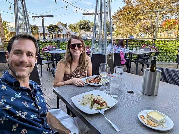 Patio dining with string lights overhead transforms a regular dinner into something that feels downright magical and memorable.