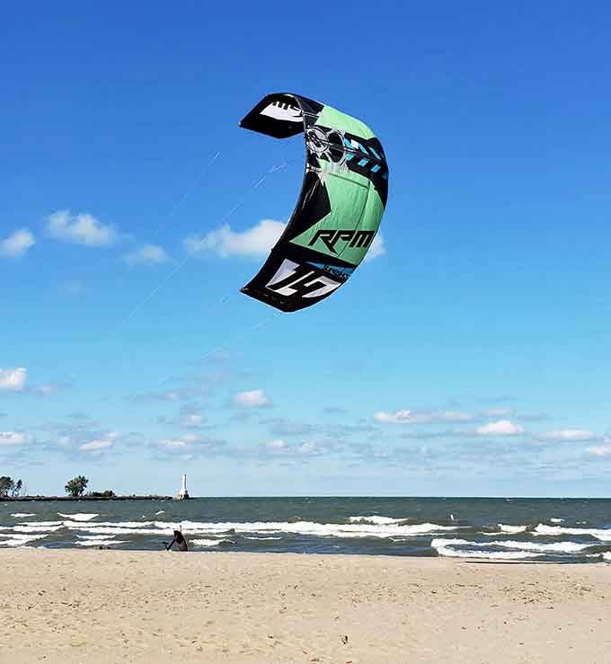 Kitesurfing on Lake Erie: because someone decided freshwater deserves the same adrenaline as ocean sports.
