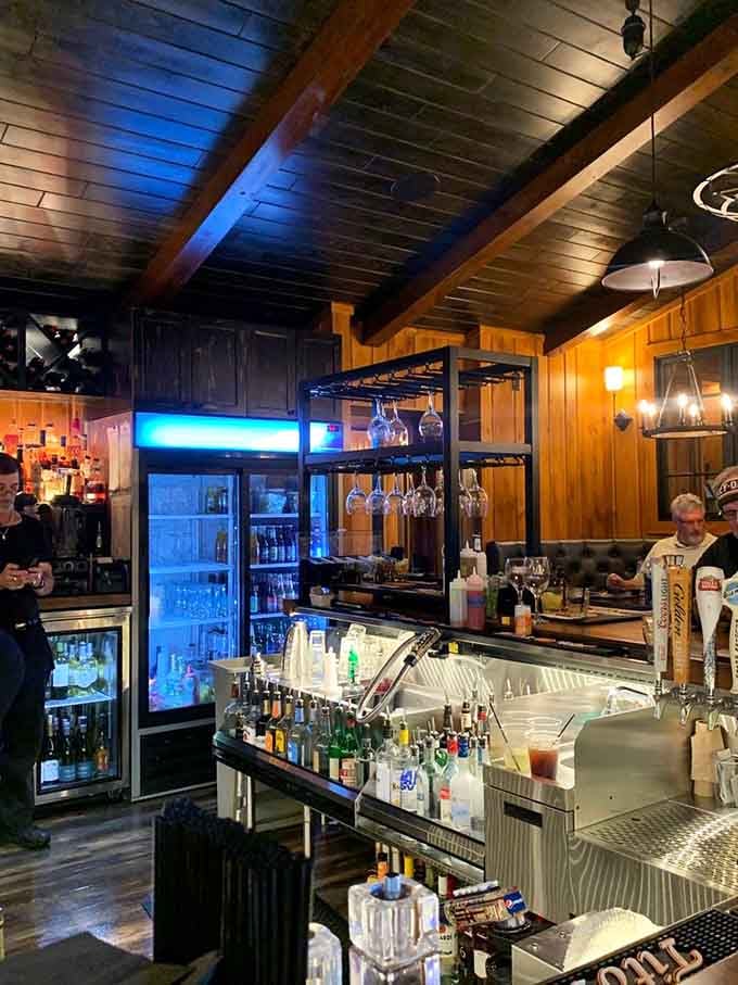 The well-stocked bar with gleaming taps and bottles promises properly made drinks in a setting that feels like home.