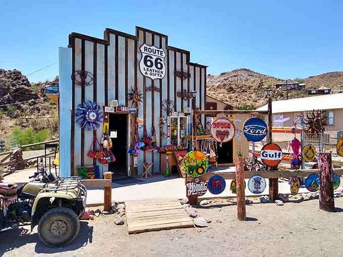 Route 66 memorabilia explodes across this storefront in a riot of color that makes minimalist designers weep into their monochrome palettes.