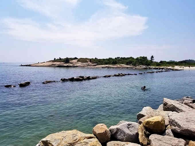 Rocky coastline meets sandy beach in a view that proves Connecticut's shoreline deserves way more credit than it gets.