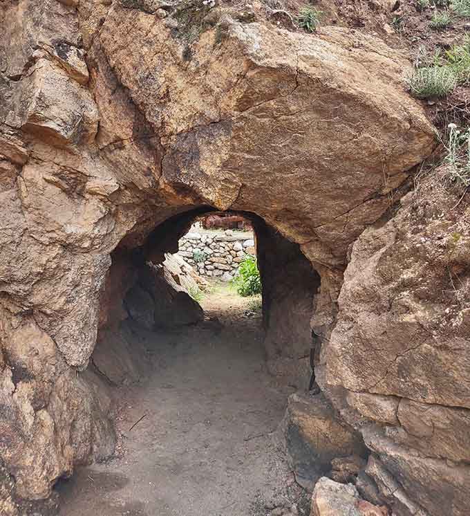 Walking through this hand-carved tunnel connects you to generations of miners who sought fortune in these hills.