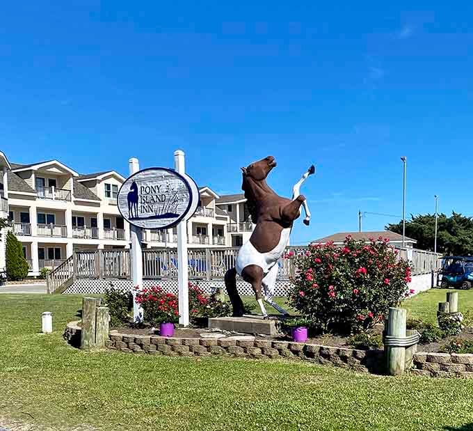 That rearing pony statue at Pony Island Inn celebrates the wild mustangs that made this island legendary.