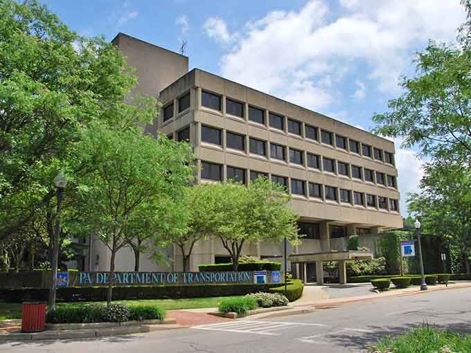 Even the Department of Transportation building looks dignified here, surrounded by mature trees and well-maintained public spaces.