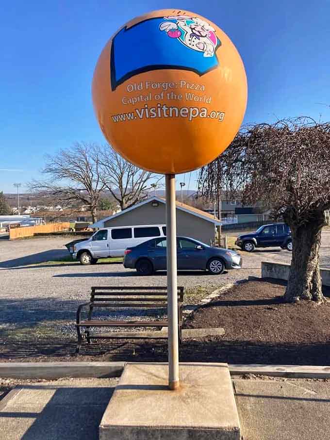 You know a town means business when they erect a giant monument declaring their pizza supremacy.