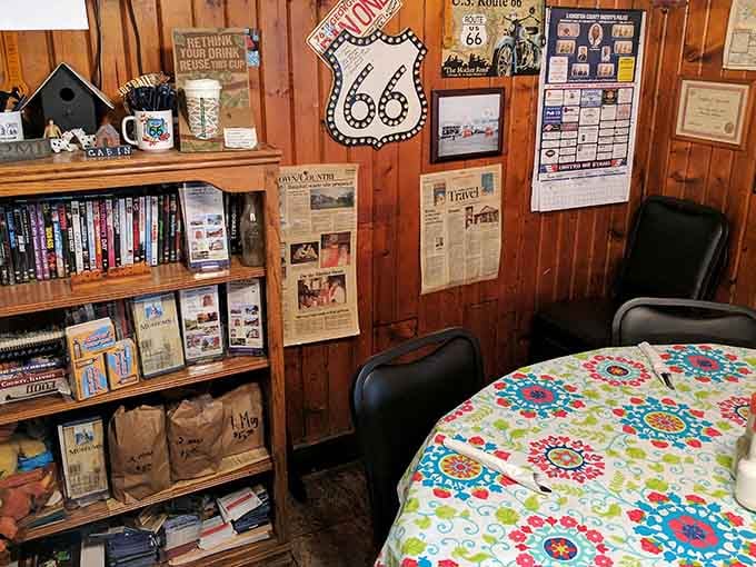 Route 66 memorabilia and reading material, because good restaurants understand people need entertainment beyond phones.