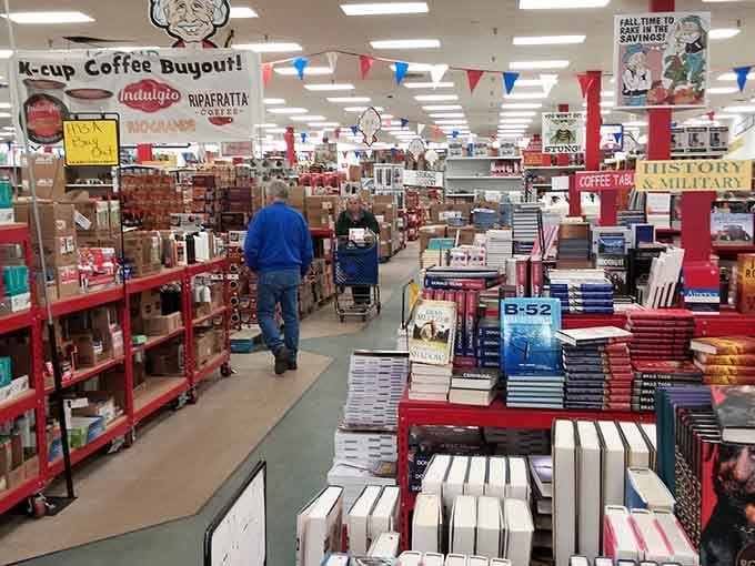 Shoppers navigating displays of possibilities, each turn revealing another reason to grab that red shopping cart.