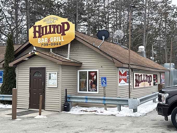 Hilltop Bar & Grill serves up local flavor in a building that's seen more Michigan winters than you have.