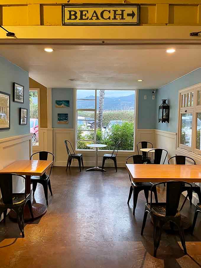 Simple tables, ocean views, and a sign pointing to the beach: perfection doesn't need much.