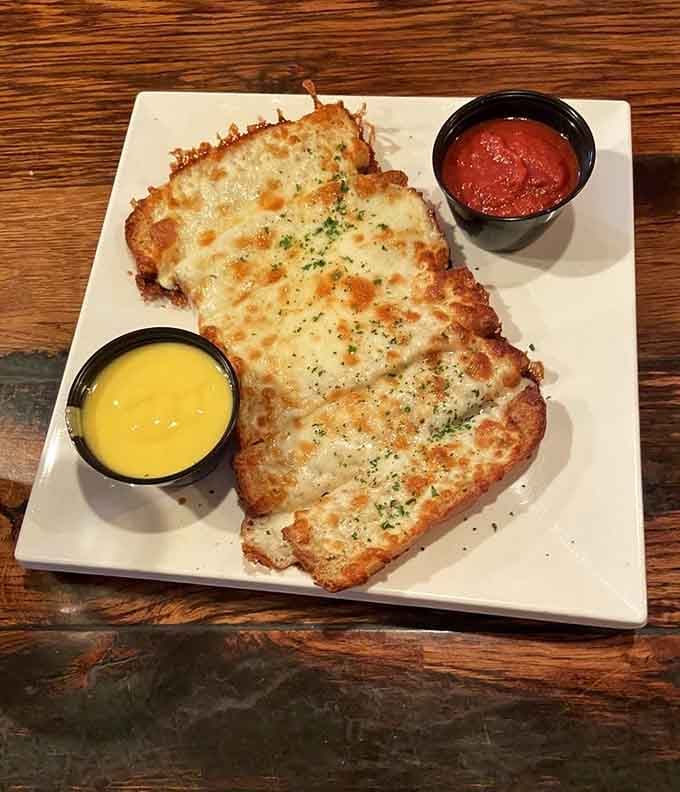 Cheese bread so golden and melty, it should probably come with a warning label about addiction potential.