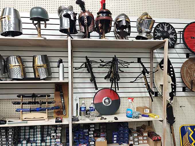 Medieval helmets displayed like artifacts from a Renaissance fair that decided to set up shop permanently indoors.