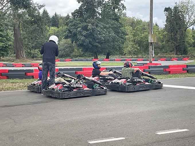 Young racers learning that the best family bonding happens at high speeds with helmets firmly attached.