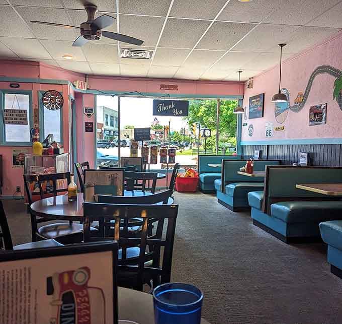 Pink walls and turquoise booths create the kind of cheerful atmosphere that makes breakfast taste even better somehow.