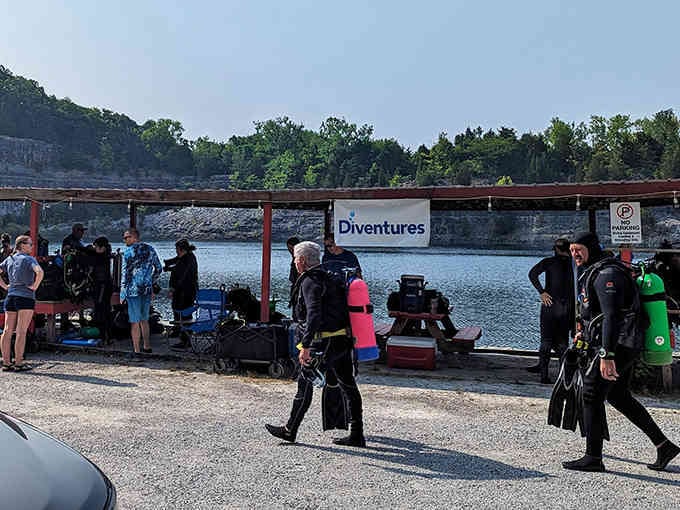 Divers gearing up for another descent, because one trip down is never enough at this quarry.