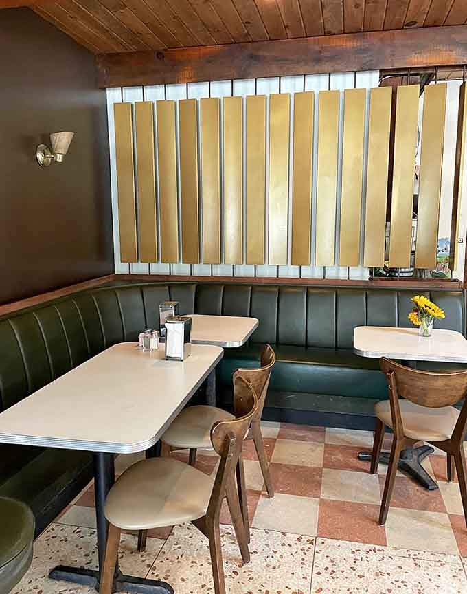 Cozy booths with fresh flowers and retro tile floors make lingering over that second cup of coffee feel absolutely mandatory.