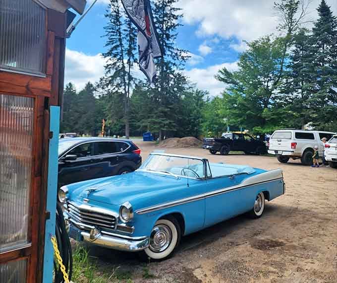 That classic convertible parked outside proves this place attracts folks who appreciate unique experiences and timeless style in equal measure.